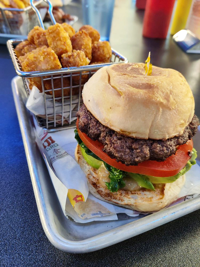 Fresh ingredients stacked with architectural precision. This California burger brings West Coast sunshine to Virginia with every bite.