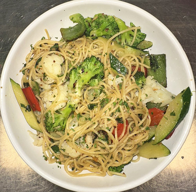 Capellini Primavera that makes eating vegetables feel like breaking the rules&mdash;delicate pasta supporting a garden's worth of crisp, colorful companions.