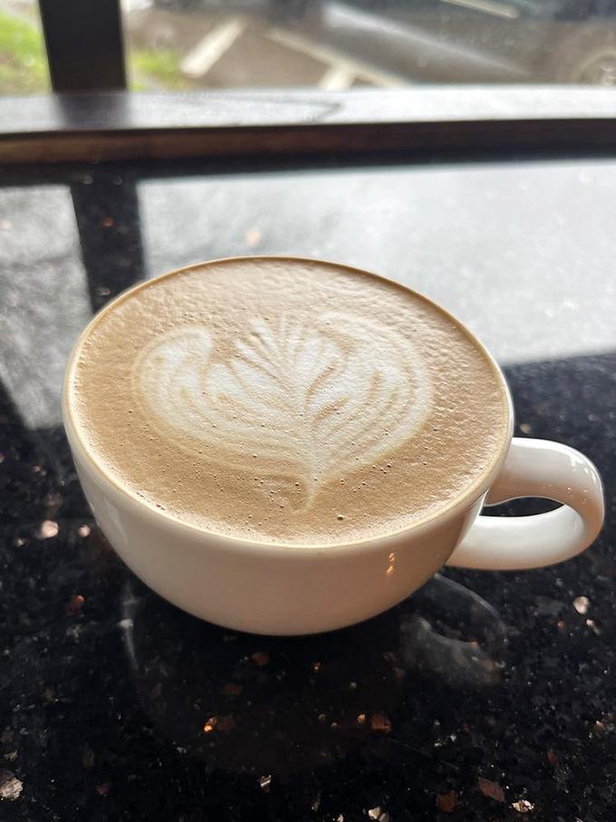 Window-side cappuccino perfection&mdash;the foam-to-espresso ratio here would make Italian baristas nod in approval while muttering "not bad for Americans."