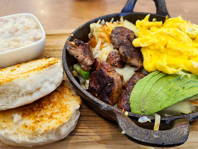 The Carne Asada Skillet arrives like a breakfast blockbuster, with perfectly cooked steak and eggs playing the heroic leads.