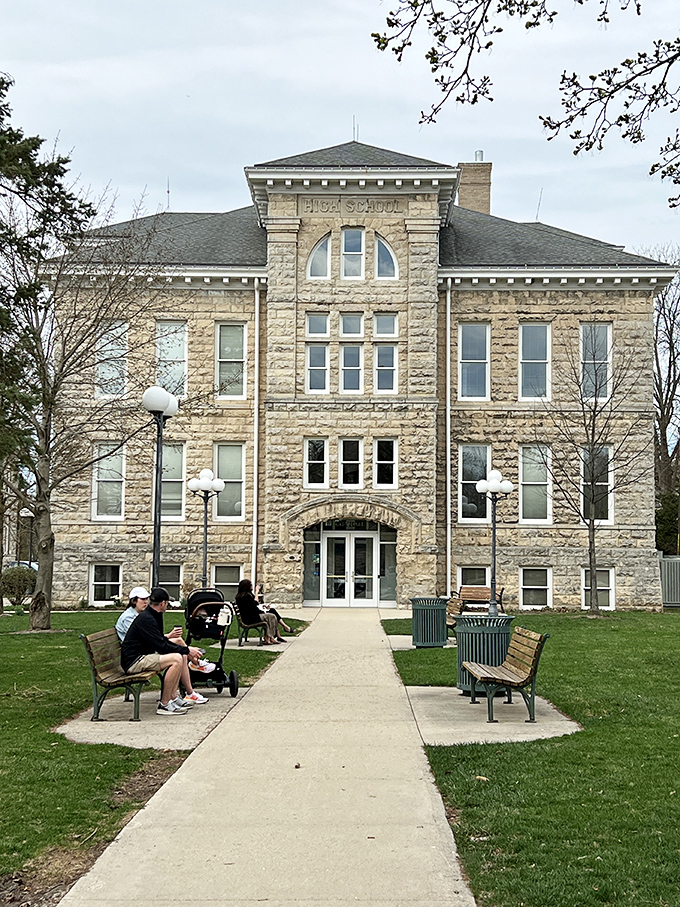 The old schoolhouse stands proud, its limestone walls having witnessed generations of Wisconsin childhoods. Learning never looked so dignified.