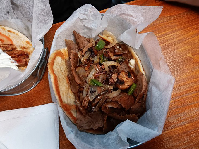 When mushrooms, onions, and perfectly seasoned meat join forces on a pita, resistance is futile. This is how flavor conspiracies should work.