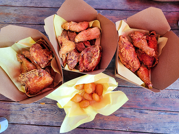 Behold the feast fit for royalty, served in humble paper. The contrast between the rustic presentation and transcendent flavor is what food dreams are made of.