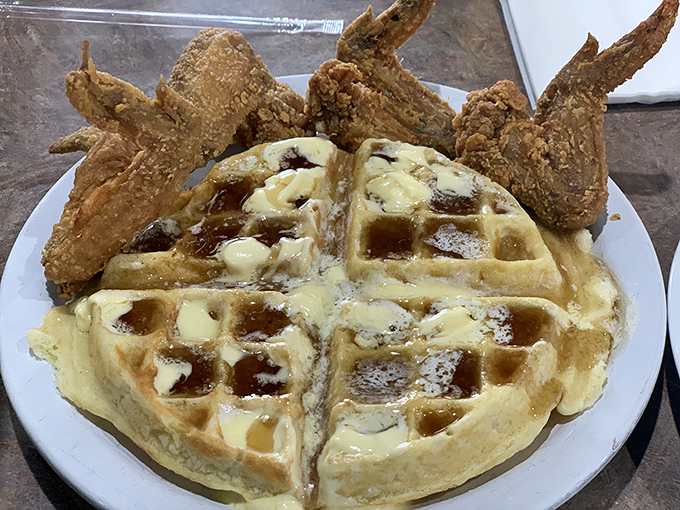 Chicken and waffles: the culinary equivalent of a perfect marriage. Crispy, savory wings perched atop golden waffles&mdash;a harmony of flavors that sings in your mouth.