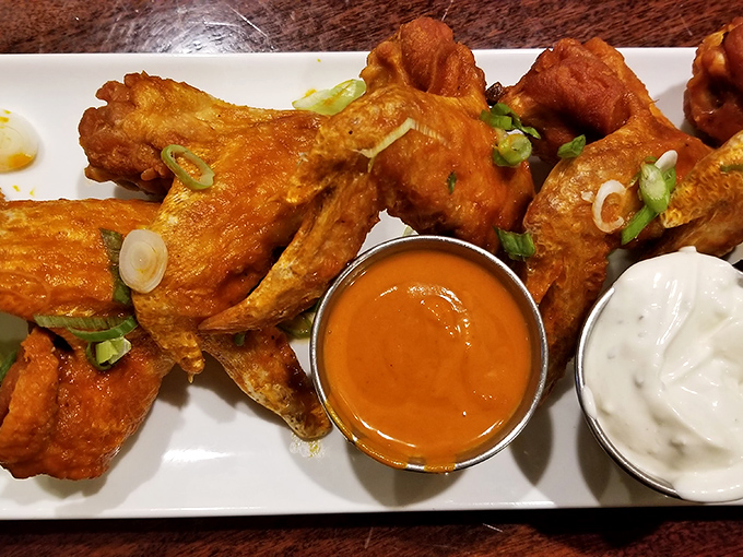 These aren't just wings – they're crispy messengers of joy, escorted by cooling ranch and that buffalo sauce that walks the perfect heat tightrope.