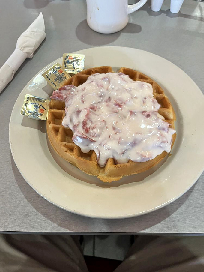 This waffle isn't just breakfast &ndash; it's an event. Swimming in glaze and big enough to have its own ZIP code.