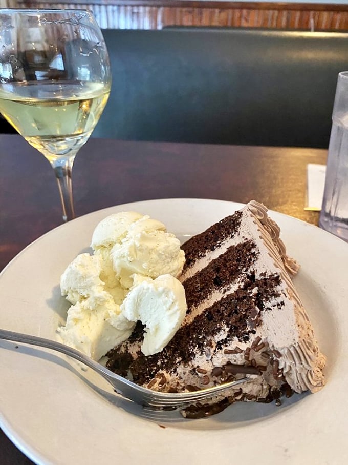 A slice of chocolate mousse cake with vanilla ice cream that makes you understand why people write poetry about dessert. Resistance is futile.