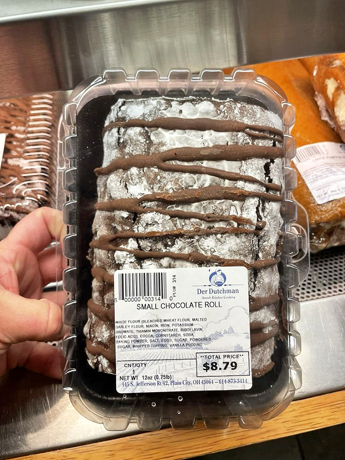 The chocolate roll looks like it's wearing a formal tuxedo of cocoa and powdered sugar&mdash;dressed up for the important occasion of meeting your taste buds.