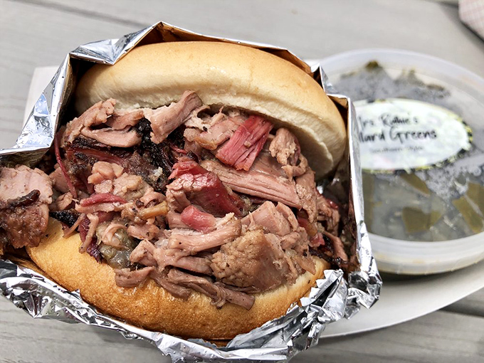 A sandwich that requires both hands and your undivided attention. This pulled meat masterpiece demands respect and napkins. Lots of napkins.