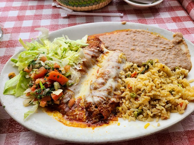 The presentation might not win Instagram awards, but these enchiladas understand that true beauty comes from within&mdash;specifically, from slow-cooked fillings and hand-crafted sauces.