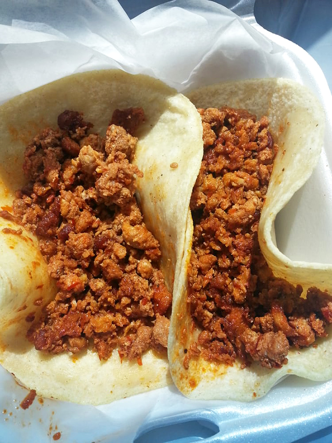 Chicken tacos with grilled onions and avocado slices that make fast food versions seem like distant, sad cousins from another culinary planet.