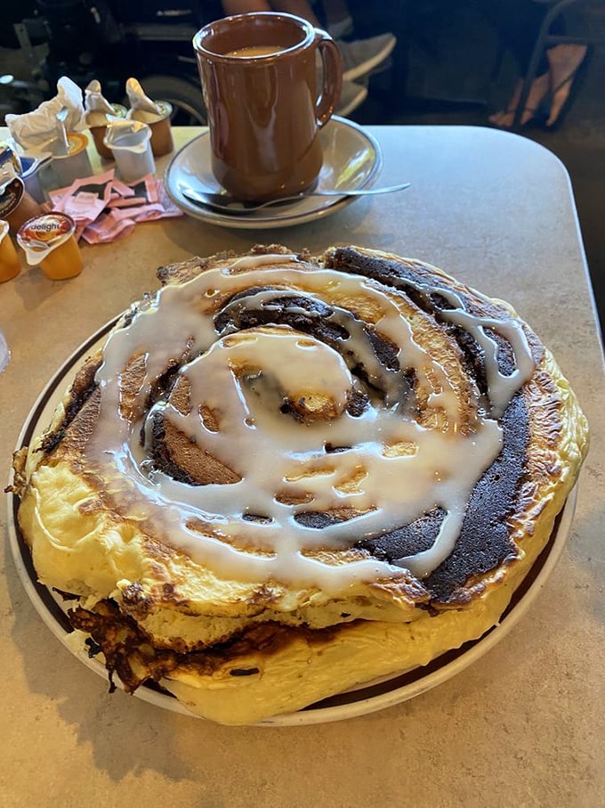 This cinnamon roll pancake is what would happen if breakfast and dessert stopped fighting and just got married already.