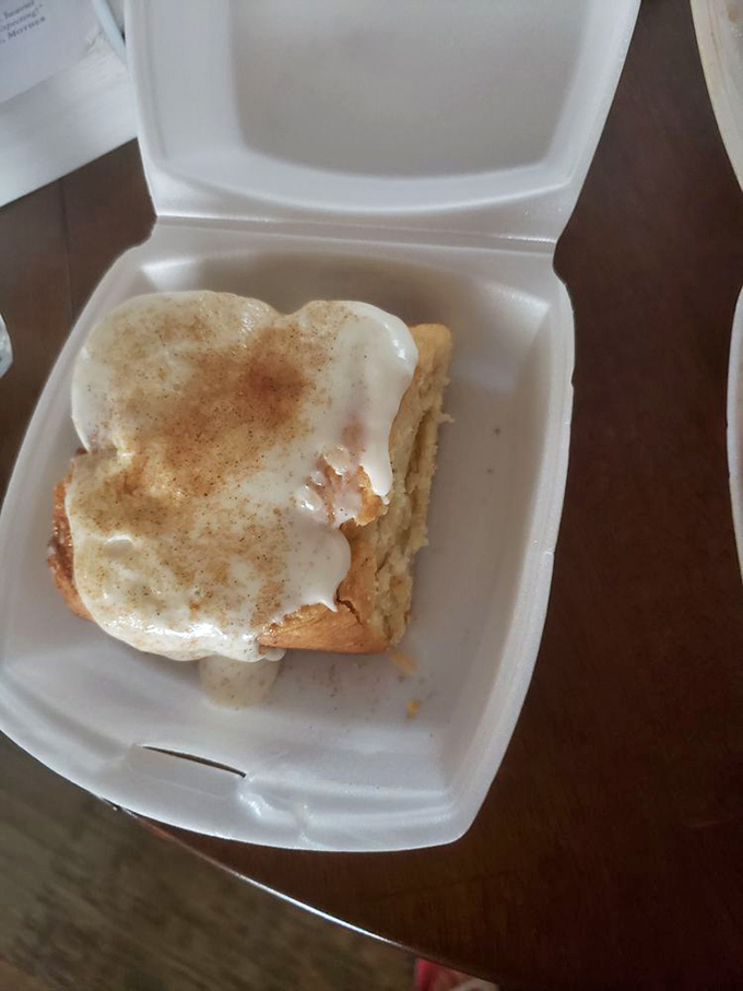 Even in a to-go container, this cinnamon roll maintains its dignity&mdash;and will likely disappear before you reach your destination.