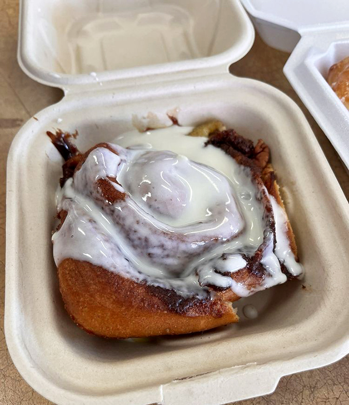 Half-eaten and fully appreciated&mdash;this cinnamon roll's demise was as sweet as its brief, glorious life on the plate.