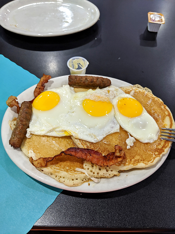 The breakfast of champions&mdash;or anyone who appreciates sunny-side-up eggs with perfect golden yolks lounging atop pancakes like they own the place.