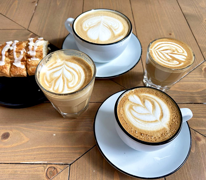 The holy trinity of morning happiness: perfect foam, rich espresso, and a white cup that knows it doesn't need to be fancy to be fabulous.