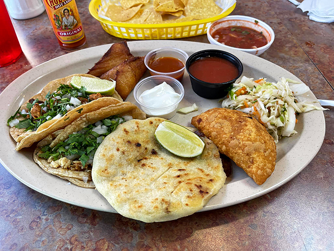 Behold the burrito in its sauce-draped glory! Like a present wrapped in a tortilla, each bite reveals layers of flavor that keep on giving. 