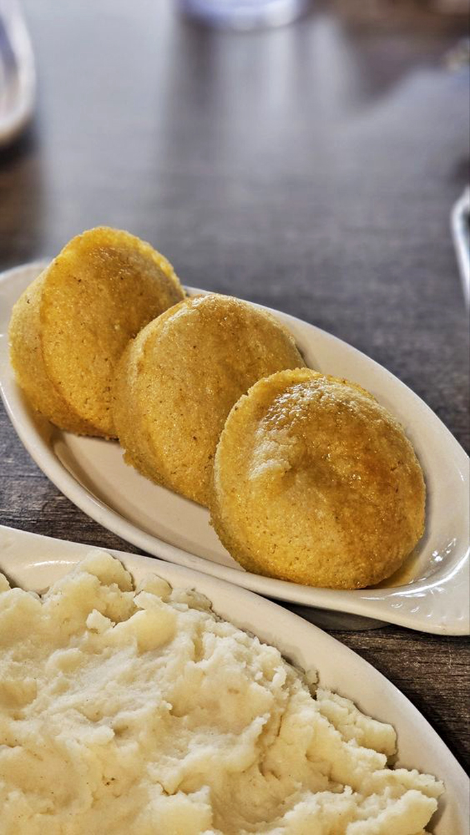 Golden cornbread discs that strike that perfect balance between sweet and savory&mdash;the kind that makes you wonder why anyone would ever use a mix.