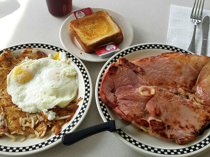 When ham is this good, it deserves its own plate. The crispy hash browns and sunny-side-up egg are just supporting actors in this breakfast drama.