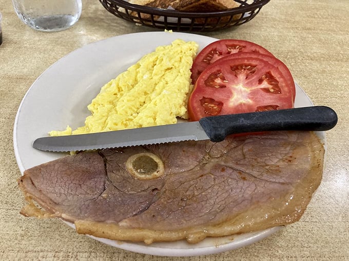 Country ham, eggs, and tomato—the holy trinity of breakfast that's been solving problems long before therapy was invented.