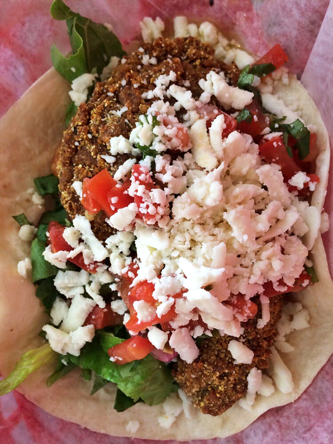 A masterpiece of texture and flavor that makes you question why you ever ate boring tacos. The crumbled cheese adds that perfect salty finish.