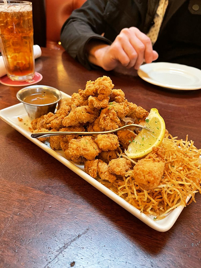 Golden-fried alligator bites that convert the skeptics. Crispy, tender, and perfect for dipping in that signature sauce.