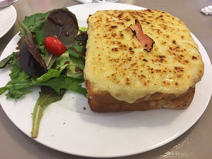 The Croque Monsieur's sophisticated French cousin has arrived, and it's wearing a perfectly bronzed cheese beret that would make Julia Child swoon.