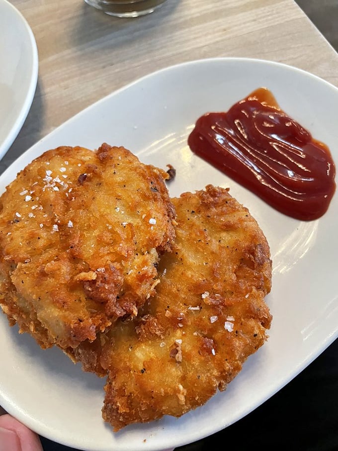 The kind of hash browns that make you question every potato decision you've made until now. That chipotle bourbon ketchup deserves its own fan club.