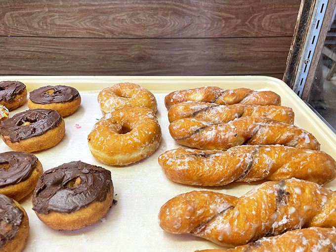 The chocolate cake donut that launched a thousand road trips. That sprinkle-to-frosting ratio is what mathematicians call "the golden delicious ratio."