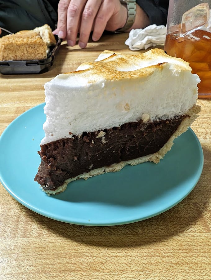 This chocolate meringue pie doesn't care about your diet plans. It's been breaking willpower since before Instagram food photos existed.