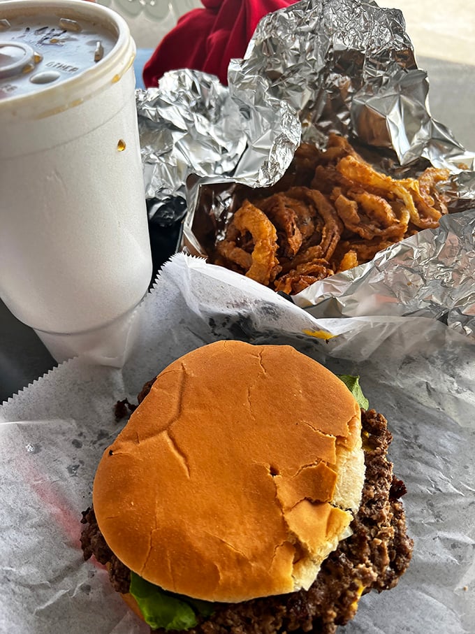 The double cheeseburger and shake combo: solving life's problems one delicious bite at a time. Napkins required, regrets forbidden.