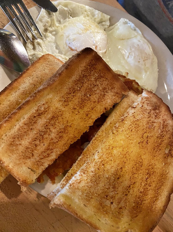 Toast that's achieved that perfect golden-brown state, alongside eggs cooked exactly how you ordered them. Breakfast fundamentals executed with surprising finesse.