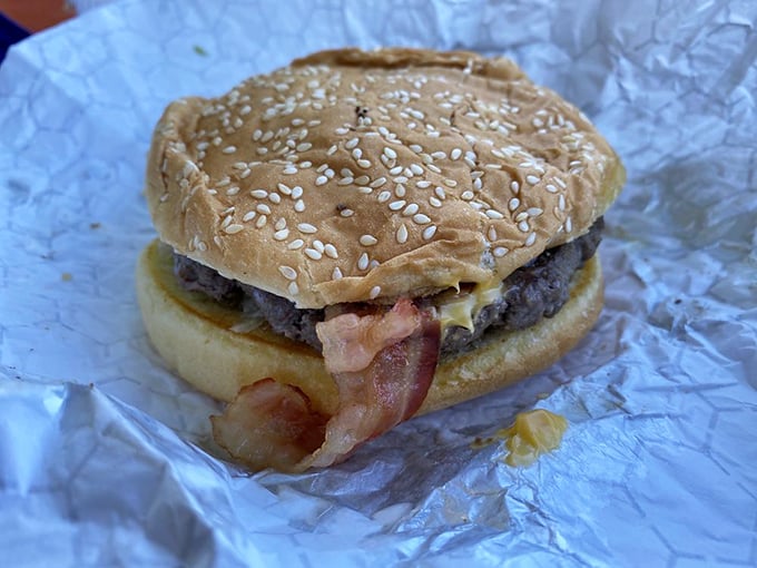 When bacon peeks out from under a bun like that, it's not just an ingredient&mdash;it's sending you a personal invitation to happiness.