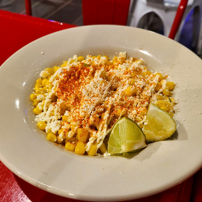 Esquites &ndash; where corn gets the VIP treatment with lime, cotija cheese, and chili powder in a symphony of Mexican street food perfection. 