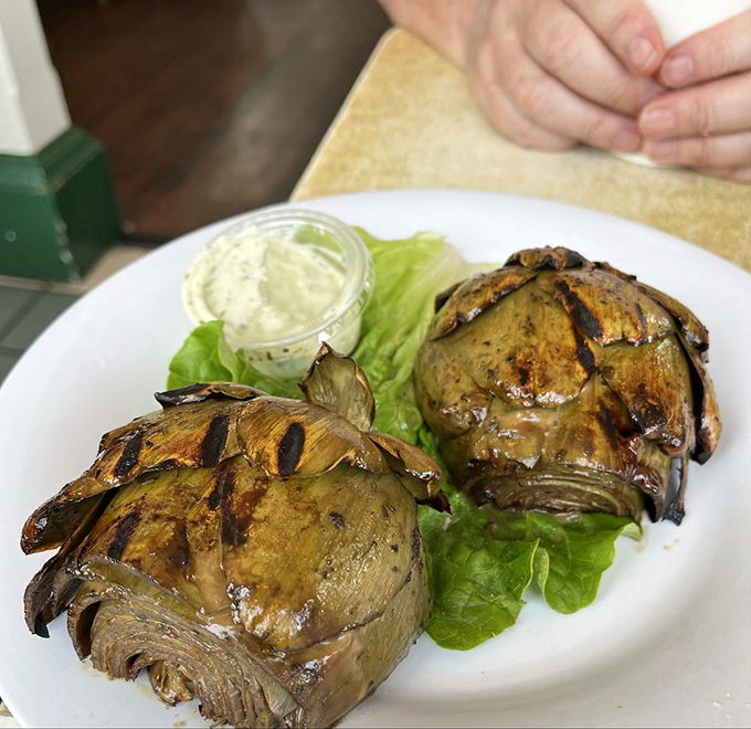 These fire-roasted artichokes look like they've been kissed by the gods of flame. Vegetable perfection that might make you temporarily forget about seafood.