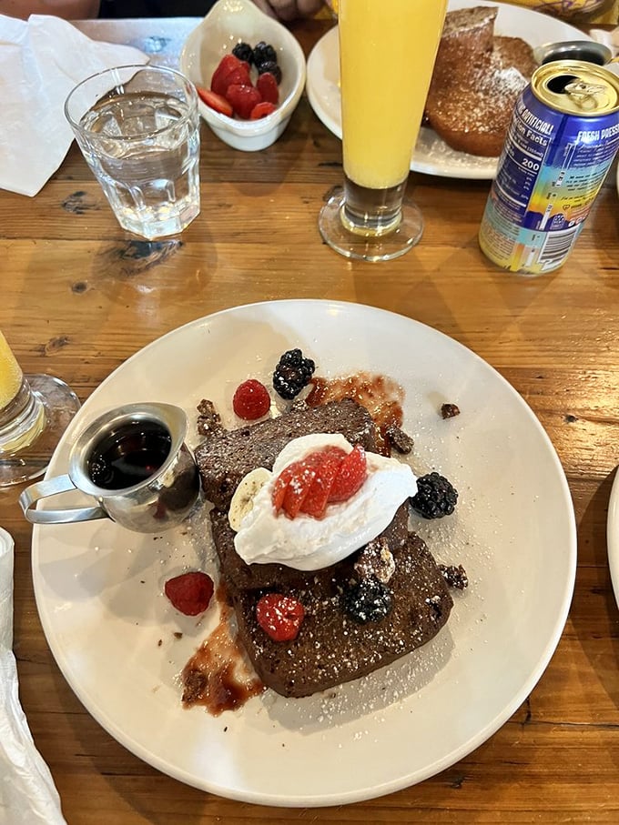 Indulge in thick-cut French toast topped with fresh berries and whipped cream&mdash;the perfect way to start a sunny weekend morning.