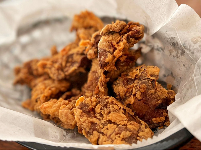 Fried chicken livers—the dish that separates Southern food tourists from the true believers. One bite converts skeptics into evangelists.