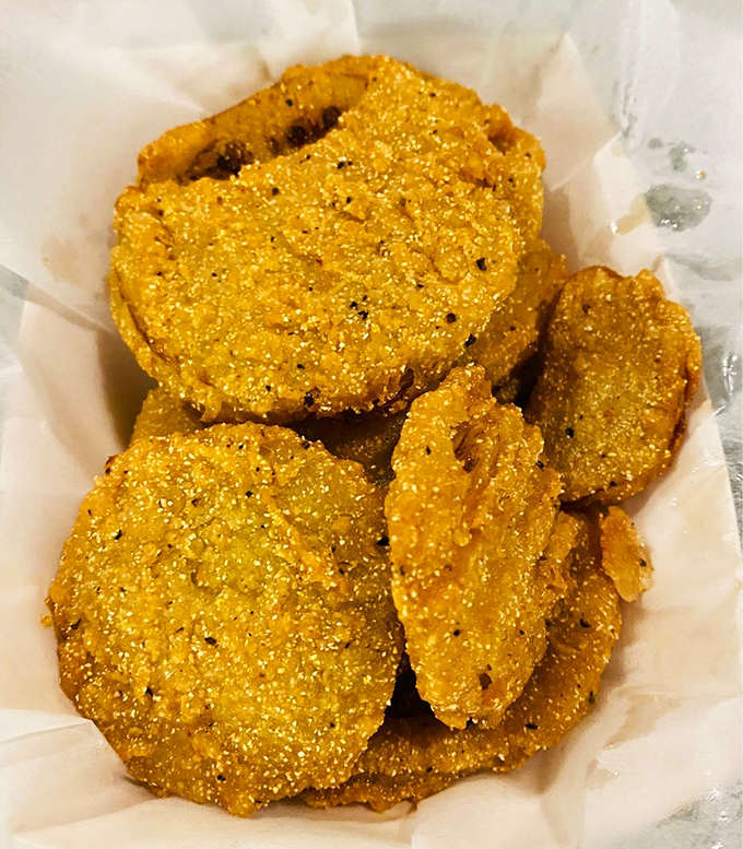 Fried green tomatoes: the Southern art of transforming something unripe into something unforgettable, one crispy medallion at a time.
