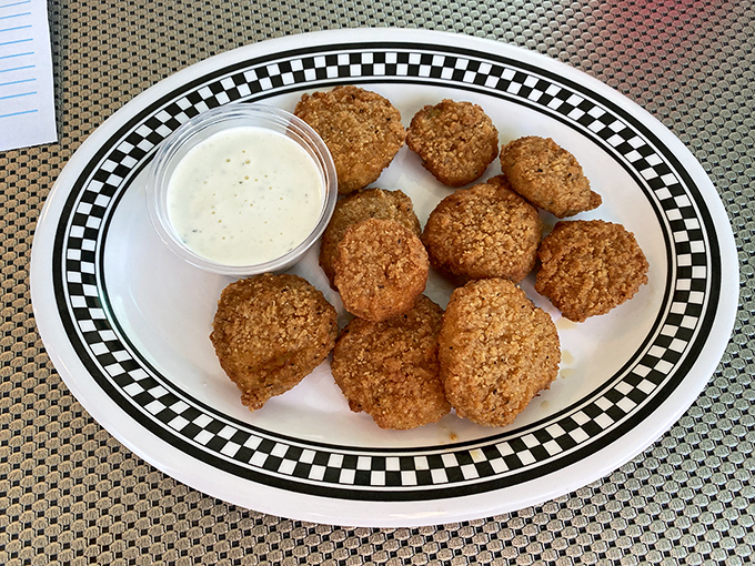 Golden-fried pickles: Proof that anything becomes magical when battered and fried. The tangy-crispy combination that dreams are made of.
