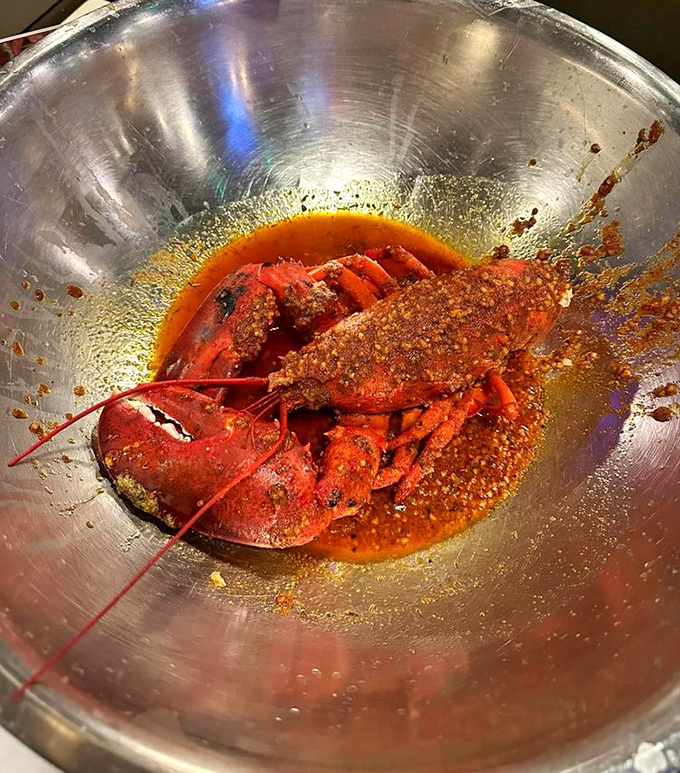 This isn't just crab; it's a glorious, spice-crusted celebration that demands rolled-up sleeves and abandoned dignity.