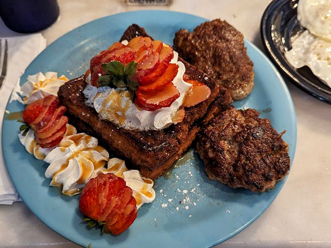 The Full Moon with sausage patties and French toast is breakfast architecture at its finest&mdash;a savory-sweet symphony that makes Monday mornings bearable again.