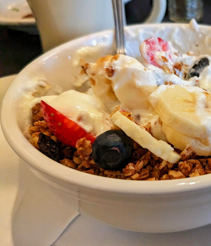 This isn't just granola—it's a carefully orchestrated symphony of textures and flavors. Those berries and bananas are the string section.
