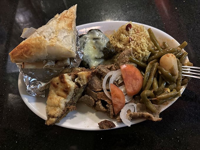 The Greek Combo plate&mdash;for when you can't decide and don't want to. Spanakopita, gyro meat, and green beans that grandma would approve of.