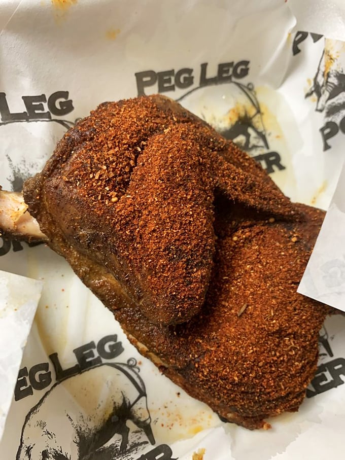 Half a chicken wearing a coat of spices like it's dressed for the Grand Ole Opry. Smoke-kissed perfection that's worth crossing state lines for. 