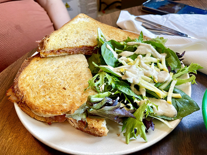This pressed sandwich achieves the golden ratio of crispy exterior to melty interior, with a side salad for virtue points.