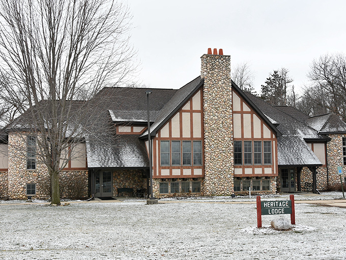 Heritage Lodge stands proudly dusted with snow, its stone-and-timber facade looking like it belongs on a holiday card from Camelot.