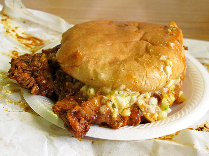 The perfect barbecue sandwich: meat piled high, slaw adding crunch, and a soft bun that's just trying to hold it all together. Like life, really.