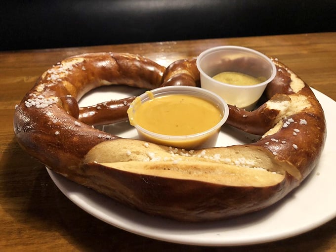 The relationship between this pretzel, its mustard, and beer cheese dip is the kind of harmonious trio that puts Crosby, Stills & Nash to shame.
