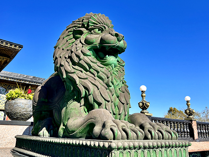 This regal green lion stands guard with an expression that says, "Yes, you're still in West Virginia, and yes, I'm still impressive."