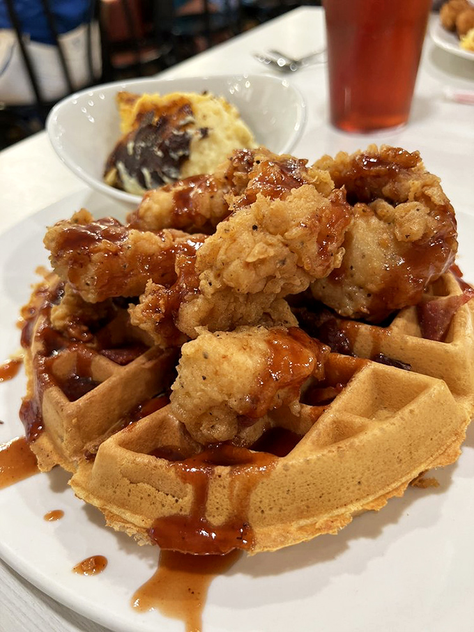 Chicken and waffles: the breakfast-dinner mashup that proves some of the best relationships are the unexpected ones. That maple bacon glaze is the matchmaker.